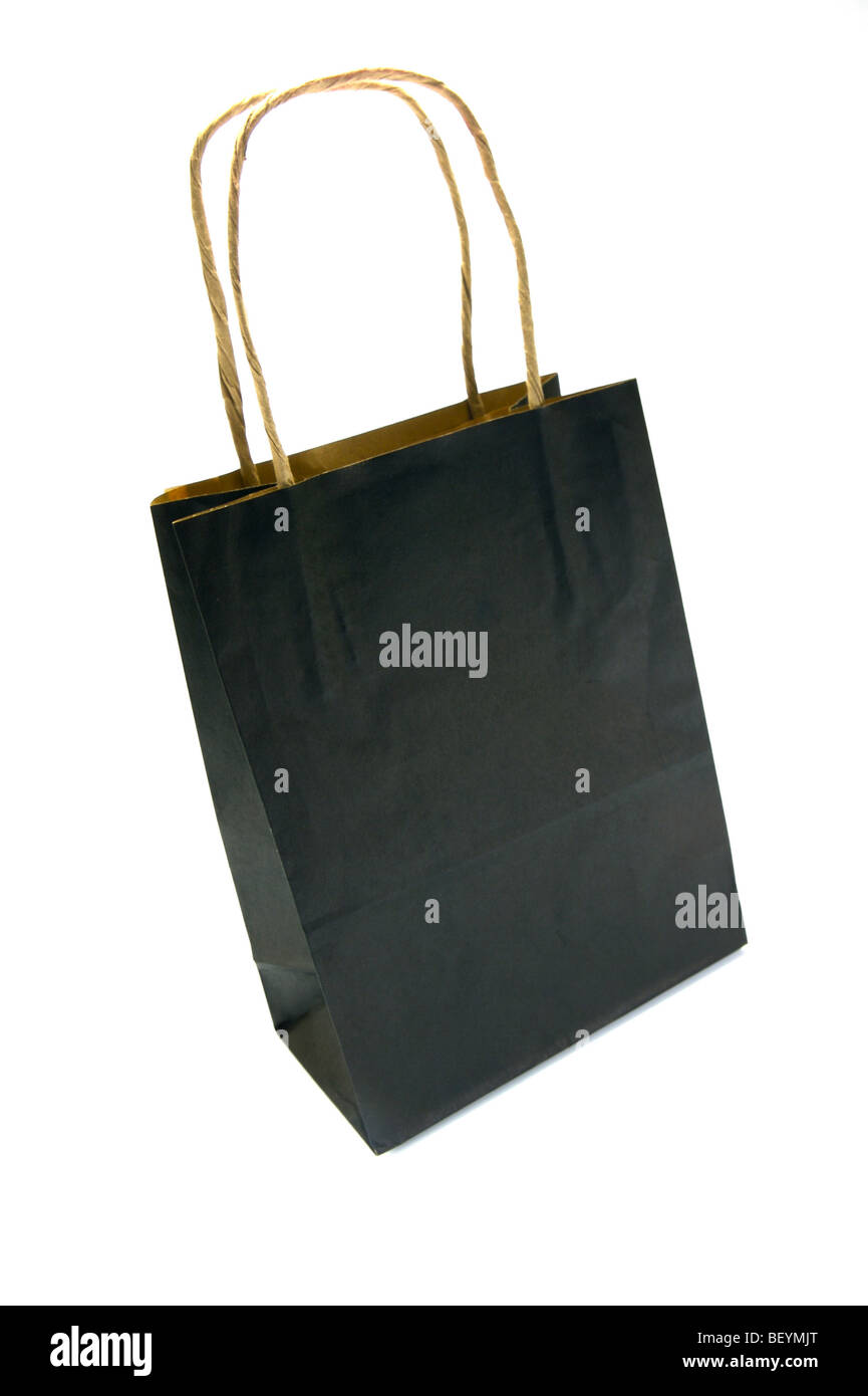 A black gift bag isolated against a white background Stock Photo - Alamy