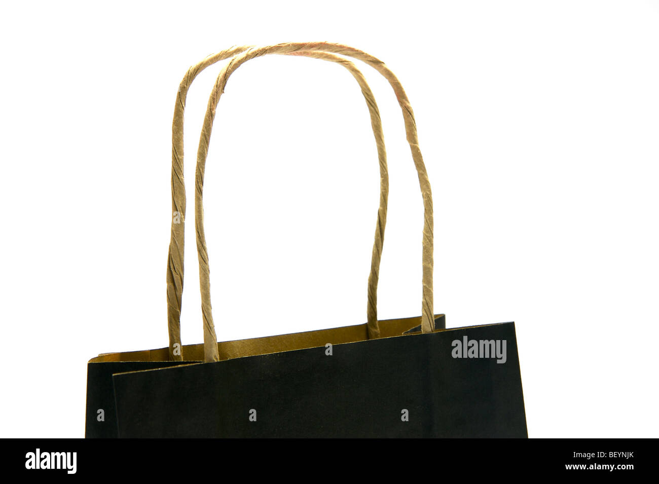 A black gift bag isolated against a white background Stock Photo - Alamy