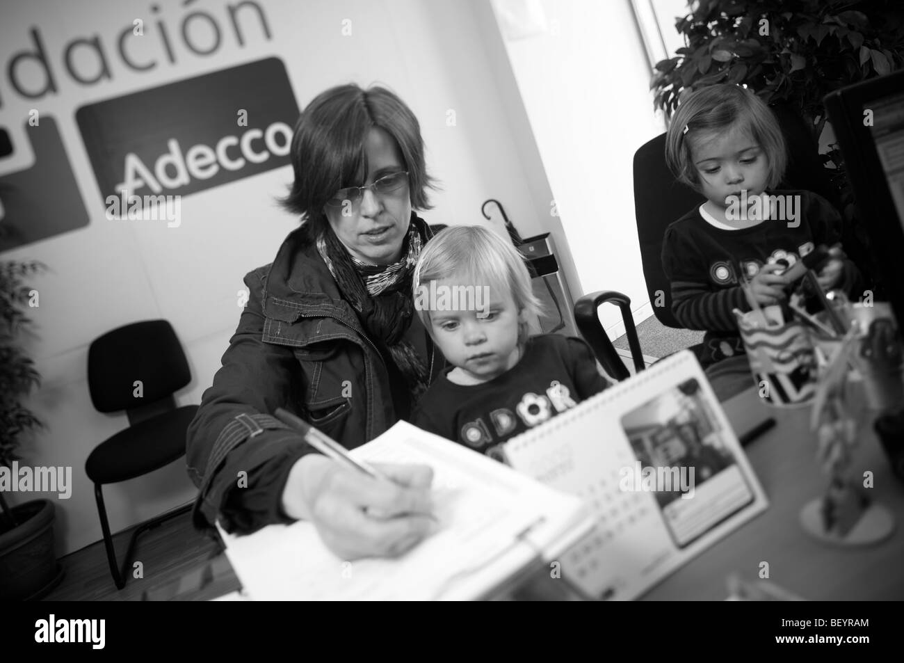 Mother and young children getting support Stock Photo - Alamy