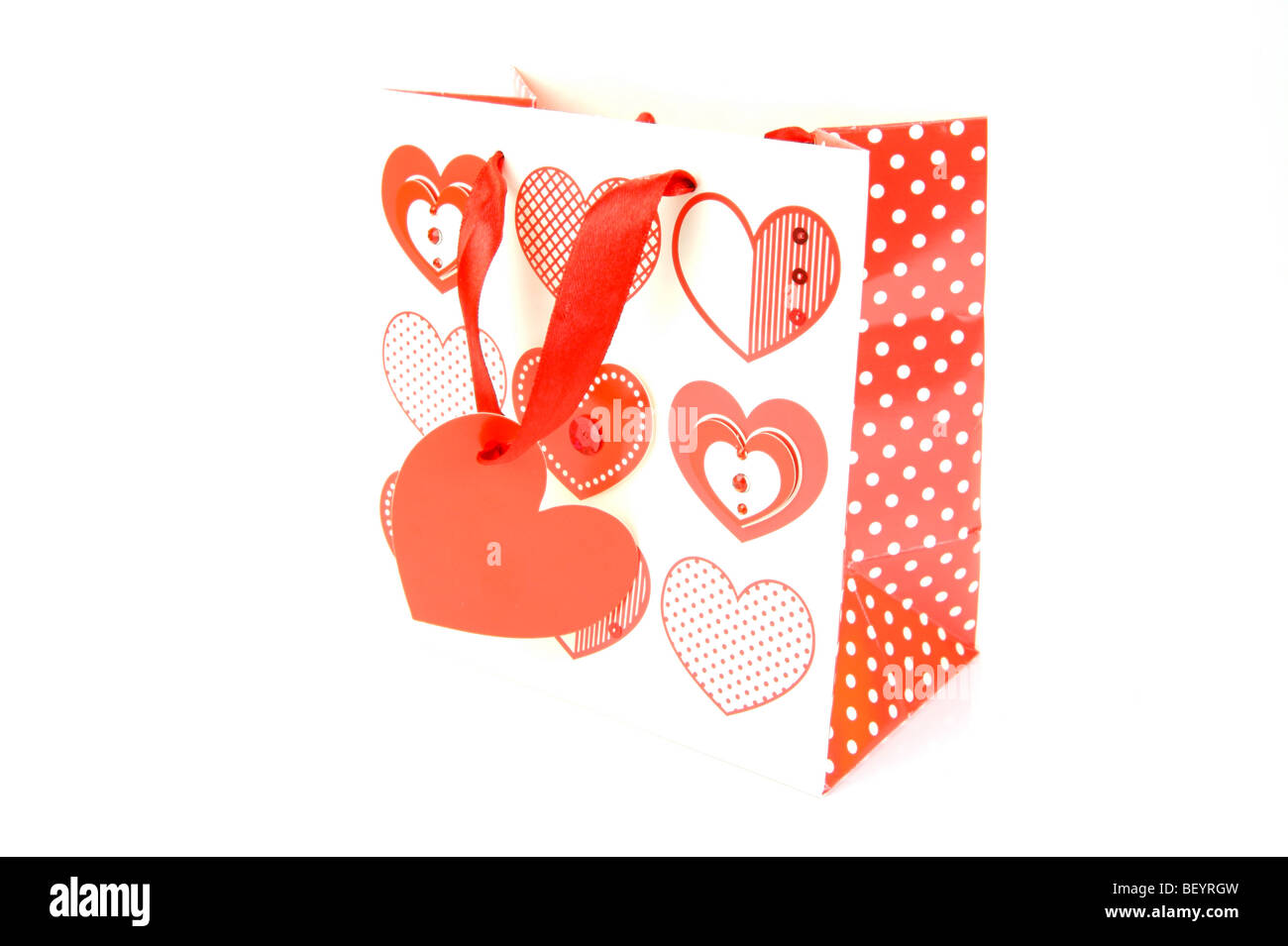 A gift bag isolated against a white background Stock Photo - Alamy
