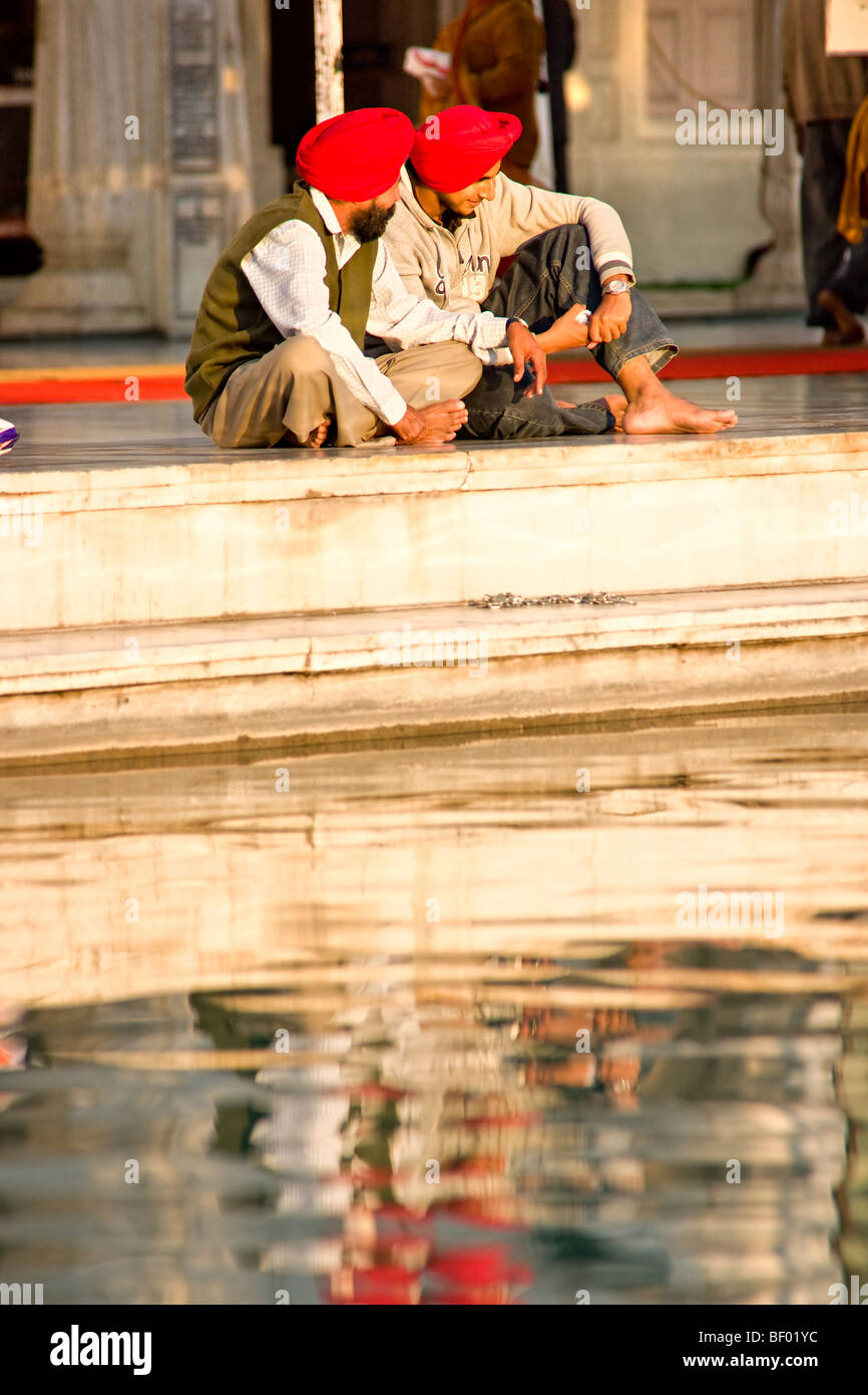 People visiting and praying at Golden Temple, Amritsar, Punjab Stock ...