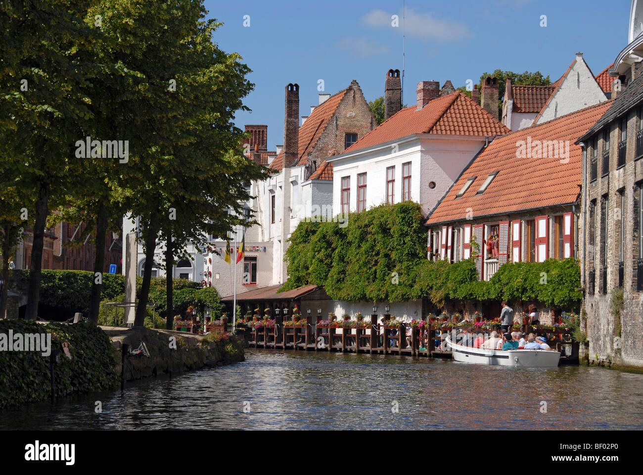 Canal boat tour Bruges, Brugge, Belgium Stock Photo - Alamy
