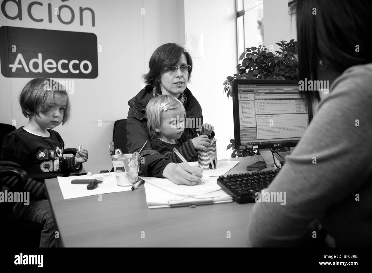 Mother and young children getting support Stock Photo - Alamy