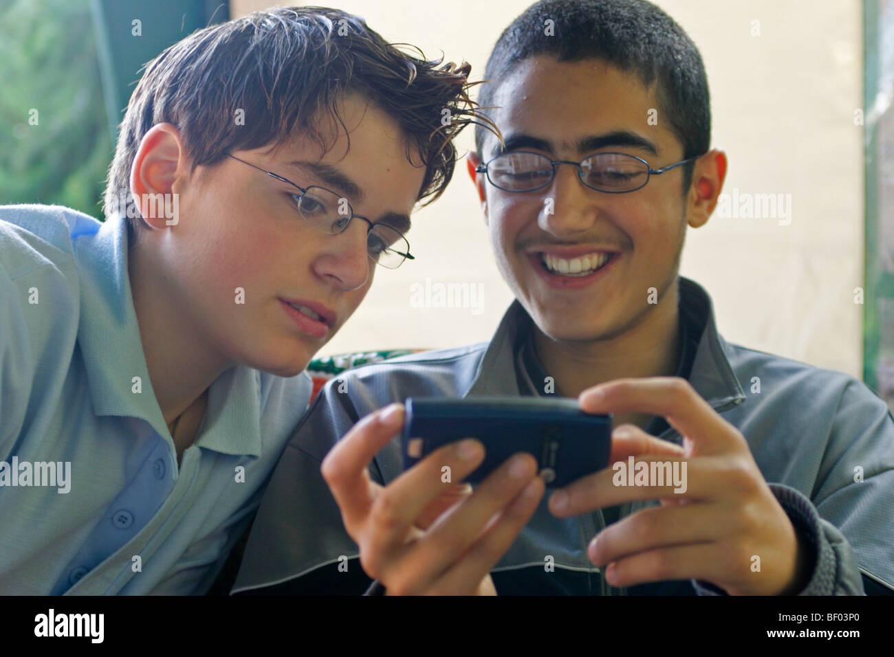 teenagers with their mobile phones Stock Photo - Alamy