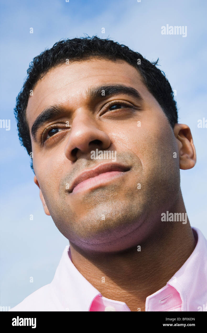 Close-up of a man thinking Stock Photo - Alamy