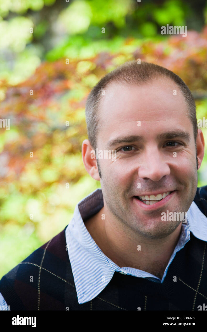 Portrait of a happy man smiling Stock Photo - Alamy