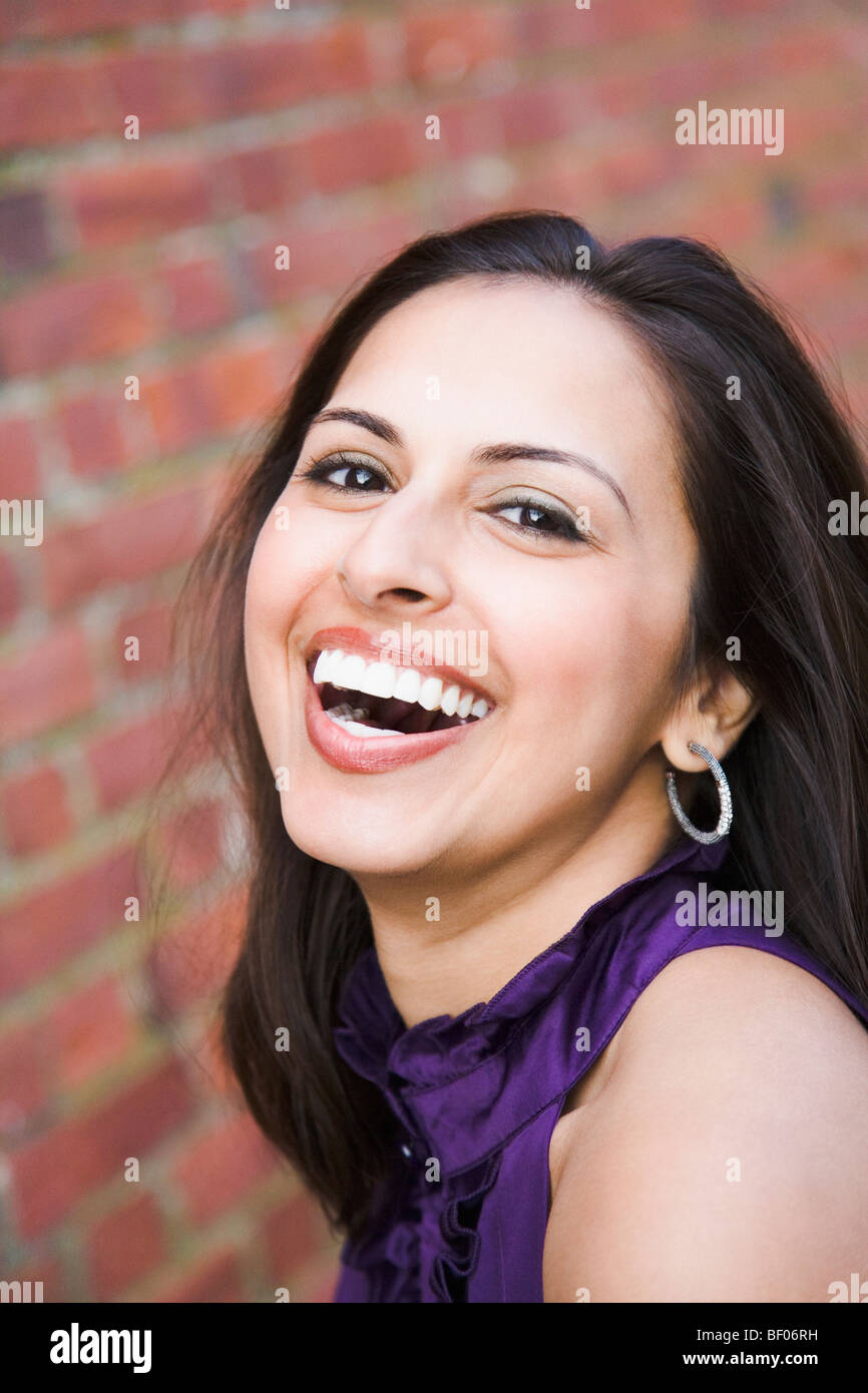 Portrait of a woman laughing Stock Photo - Alamy