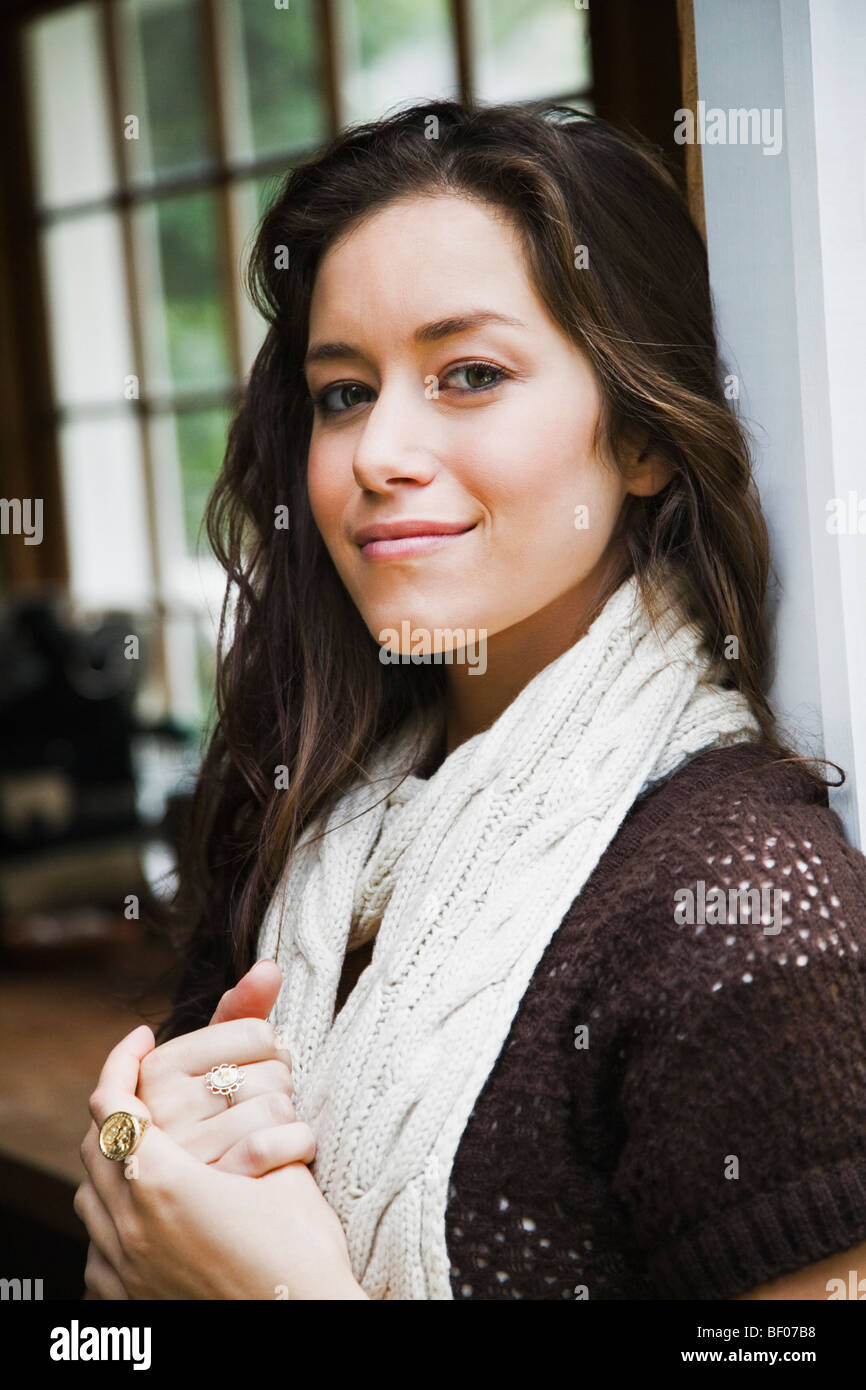 Portrait of a woman smirking Stock Photo - Alamy