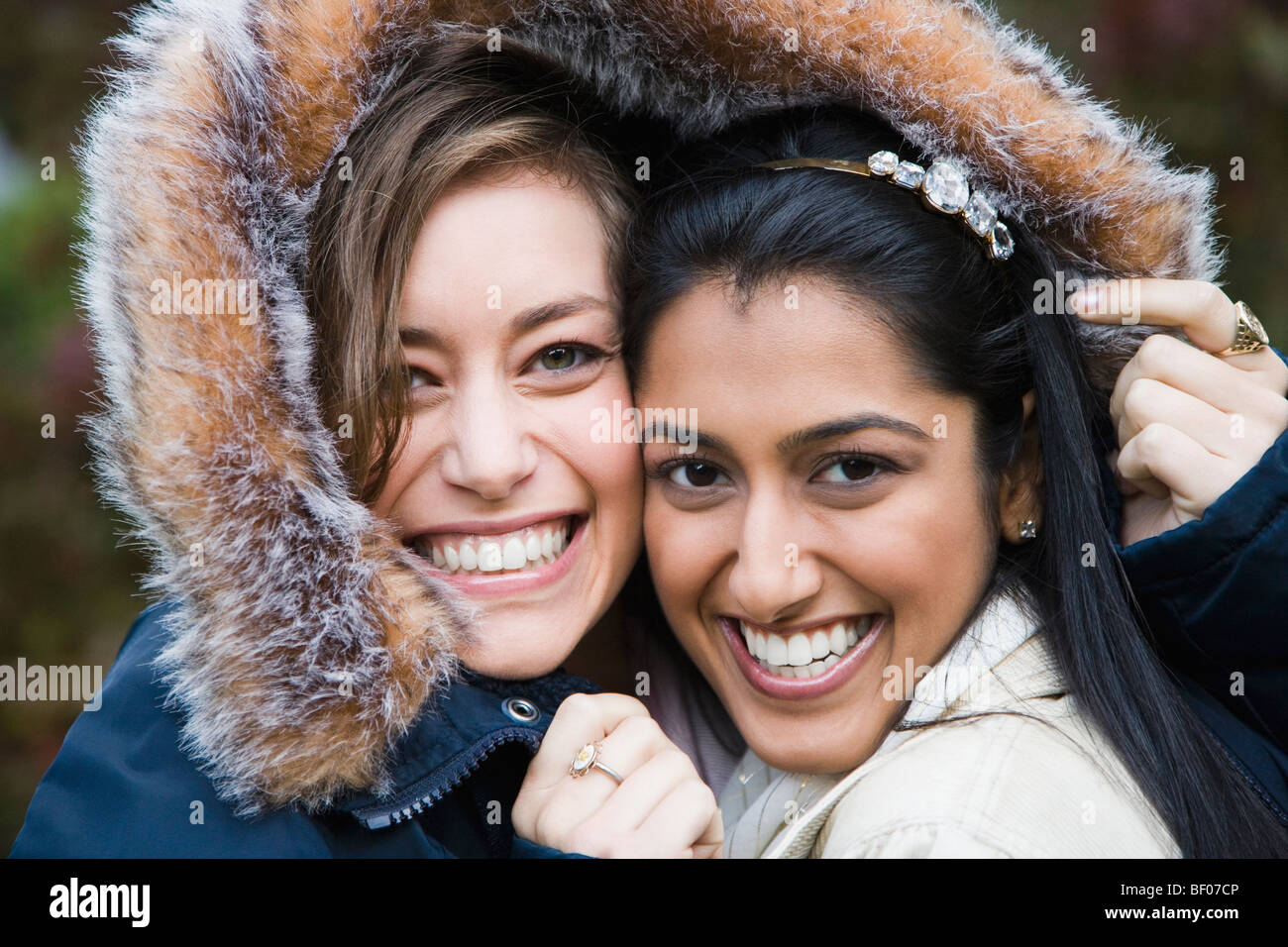 Portrait of two women smiling Stock Photo - Alamy