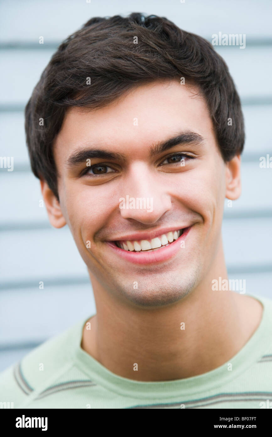 Portrait of a happy man smiling Stock Photo - Alamy