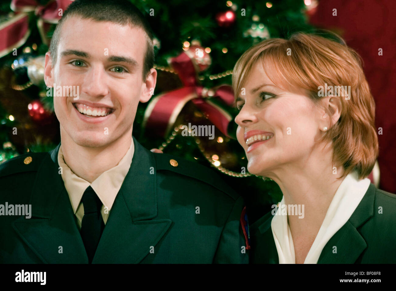 Portrait of a young man with his mother Stock Photo - Alamy
