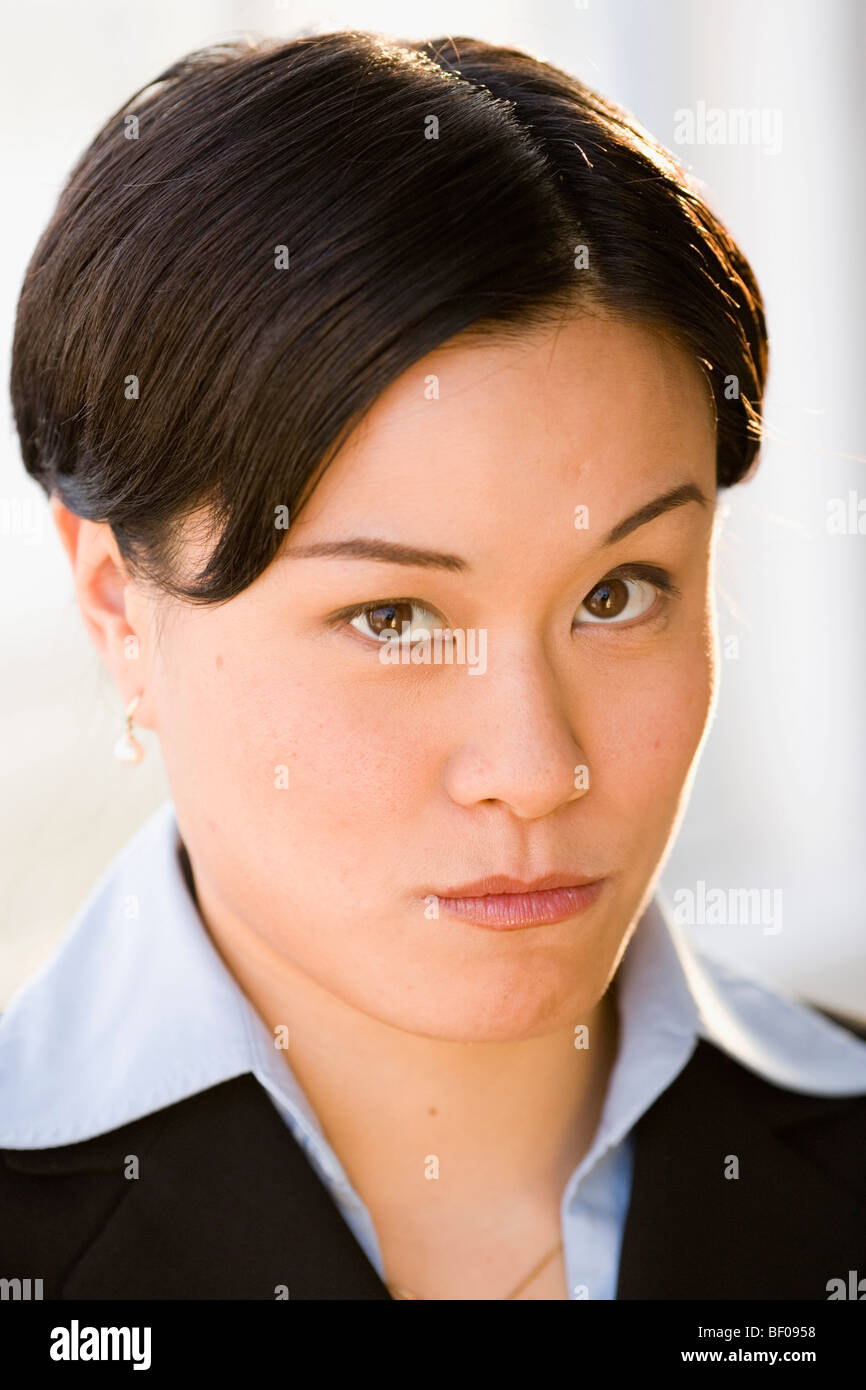 Portrait of a businesswoman looking angry Stock Photo - Alamy Portrait of a businesswoman looking angry Stock Photo - Alamy