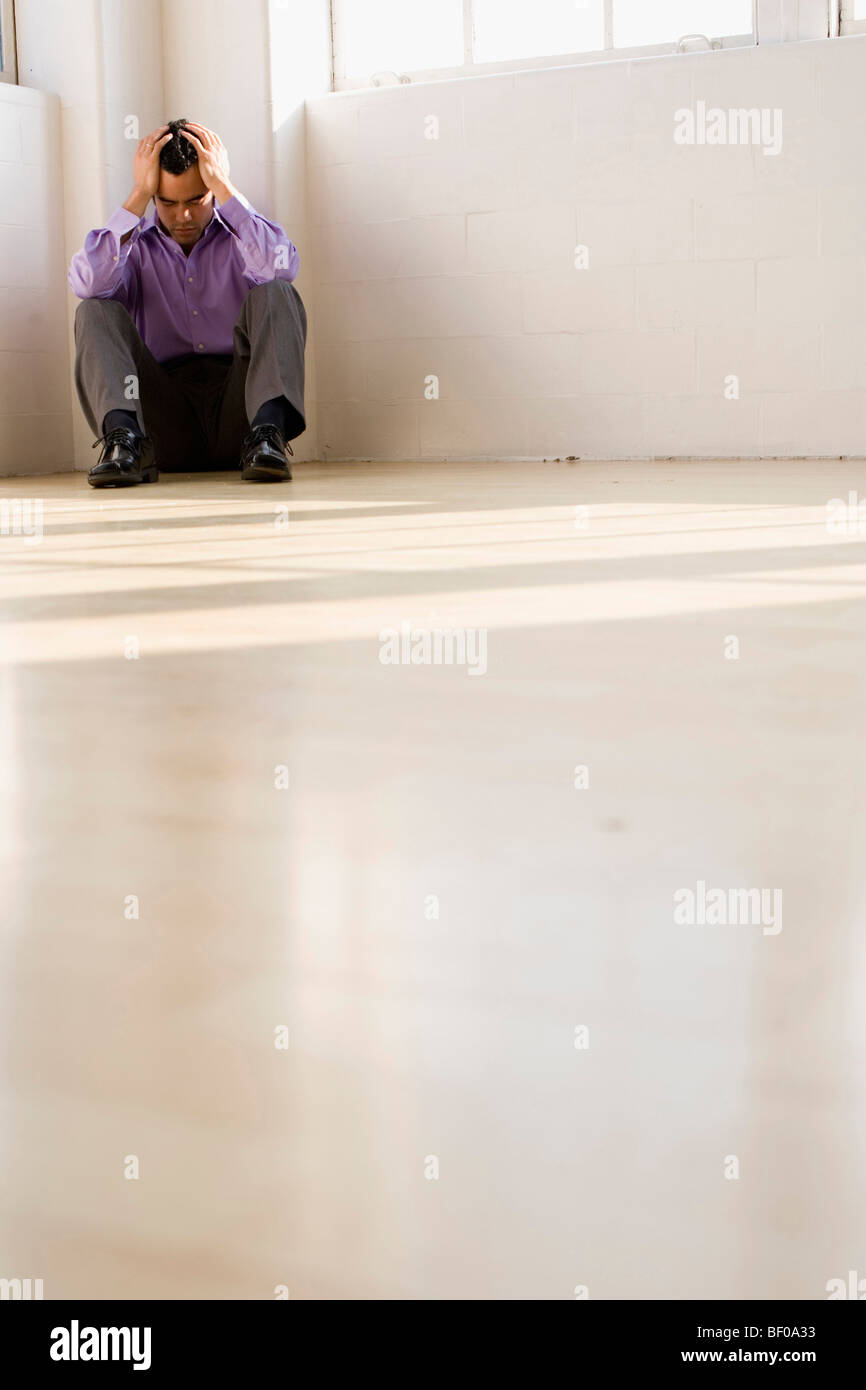 Sitting In Corner Head In Hands High Resolution Stock Photography and ...