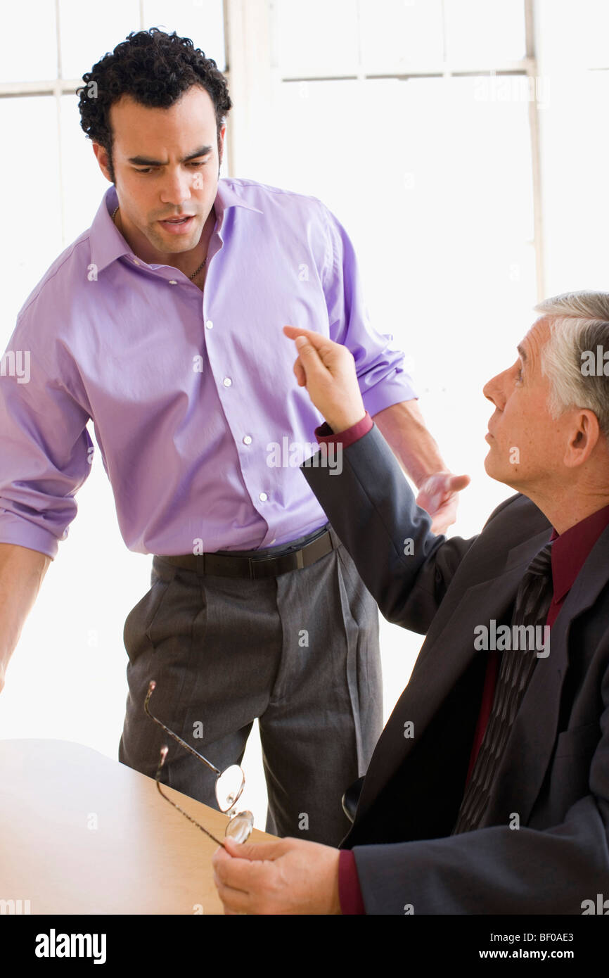 Two businessmen arguing with each other Stock Photo - Alamy