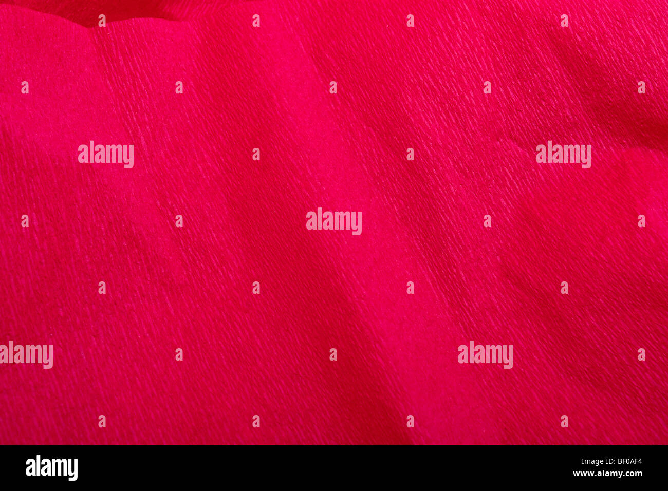 Red crepe paper christmas background / texture Stock Photo - Alamy