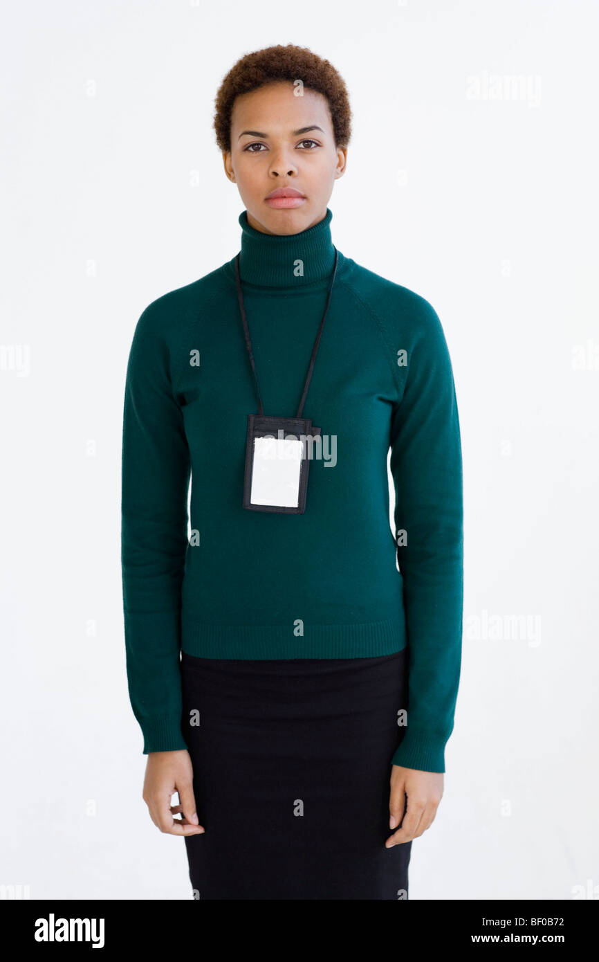 Businesswoman looking serious wearing an id card around her neck Stock ...