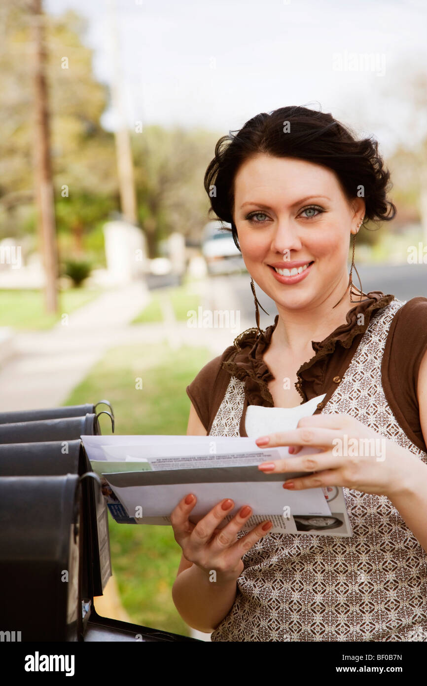 Person at mailbox hi-res stock photography and images - Alamy