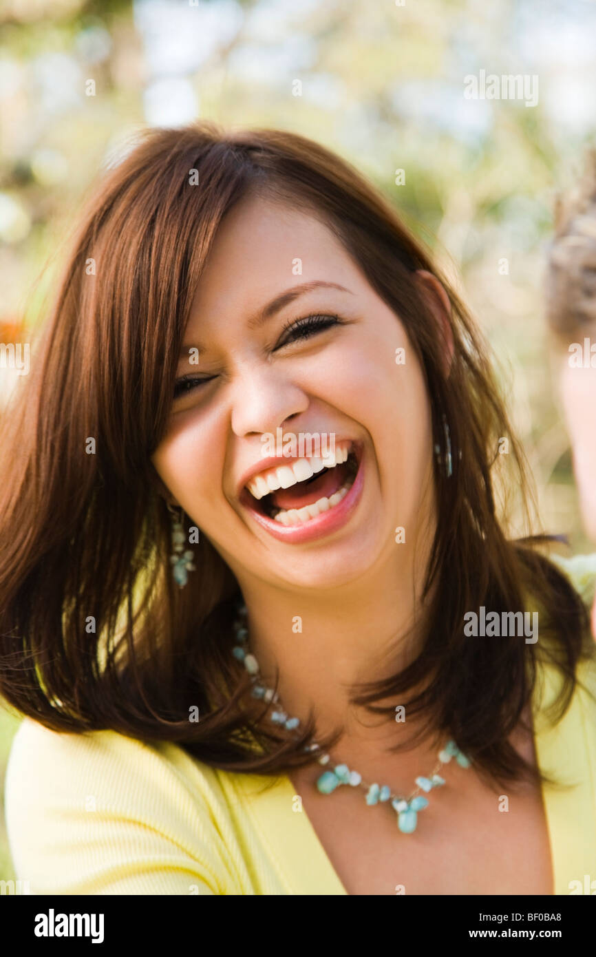 Portrait of a woman laughing Stock Photo - Alamy