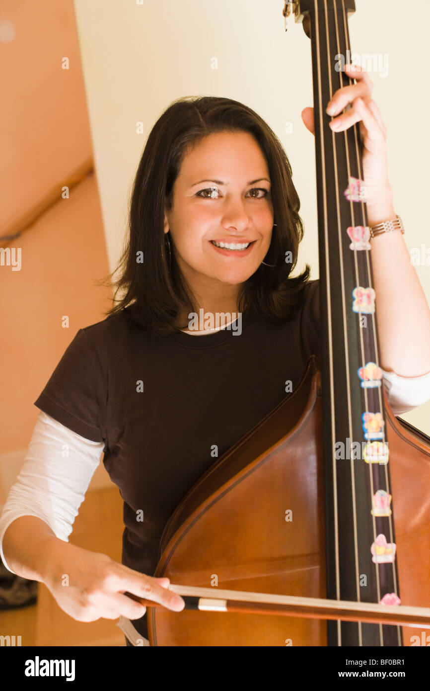 Woman playing mandolin hi-res stock photography and images - Alamy