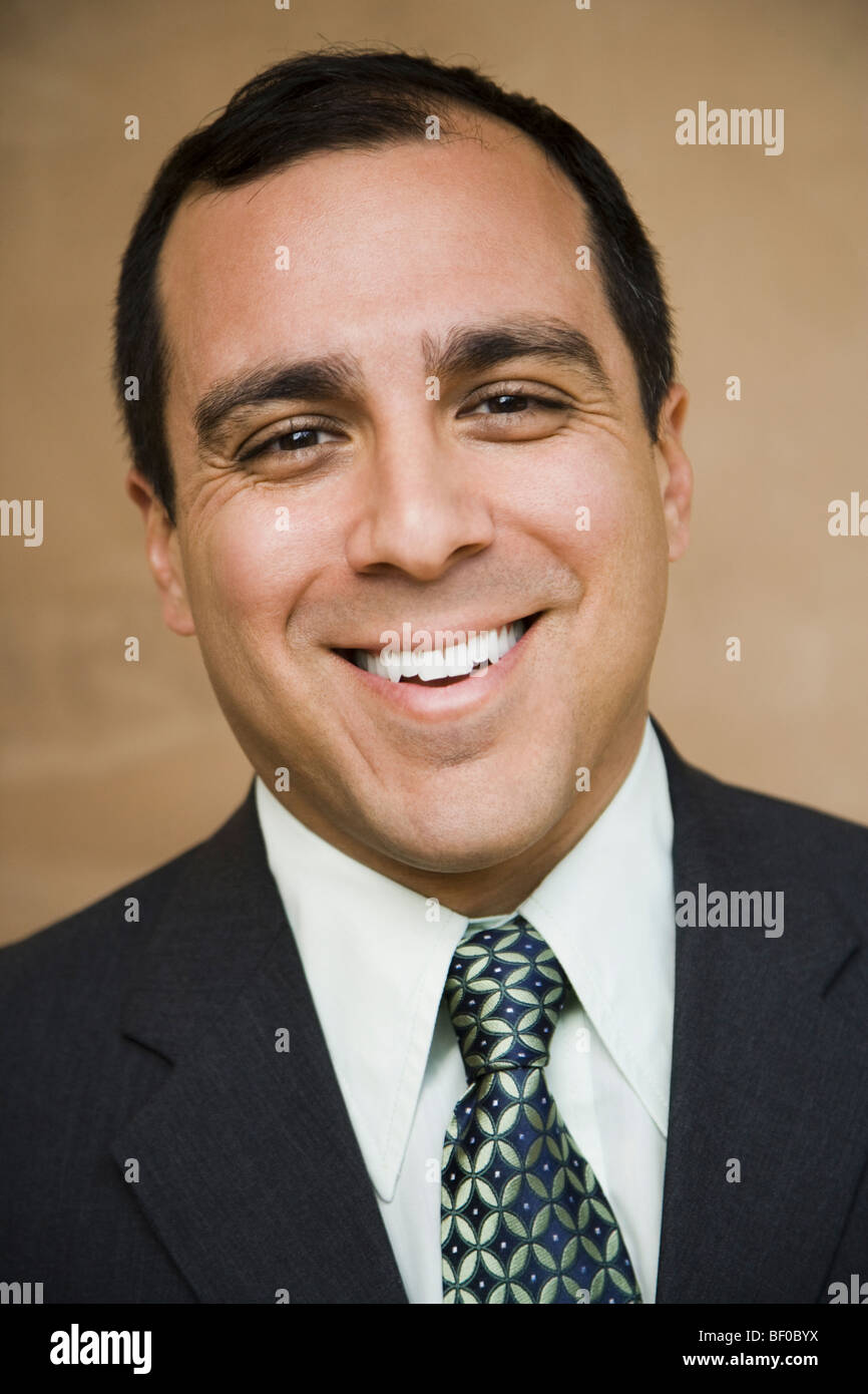 Portrait of a businessman smiling Stock Photo - Alamy