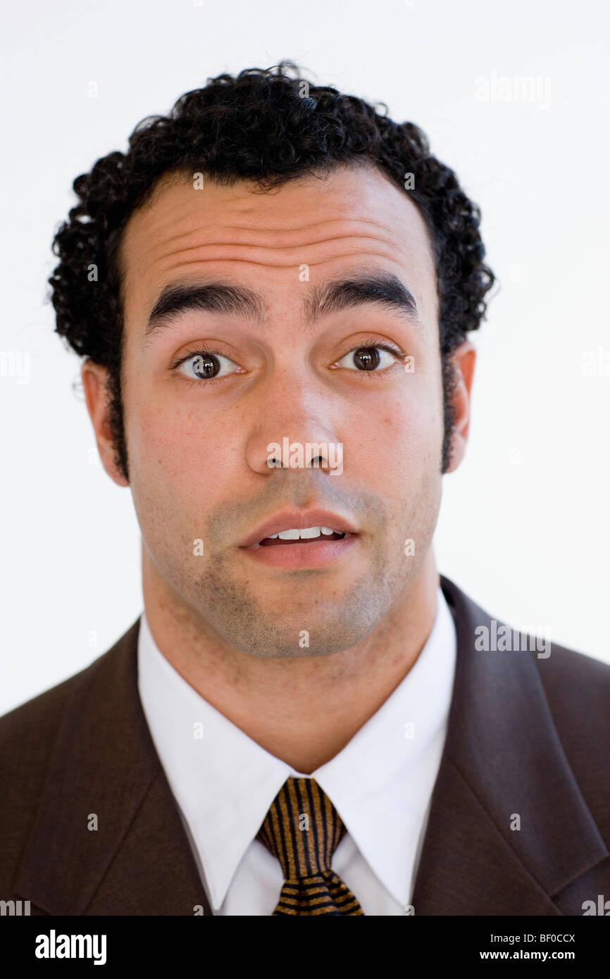 Portrait of a businessman looking serious Stock Photo - Alamy