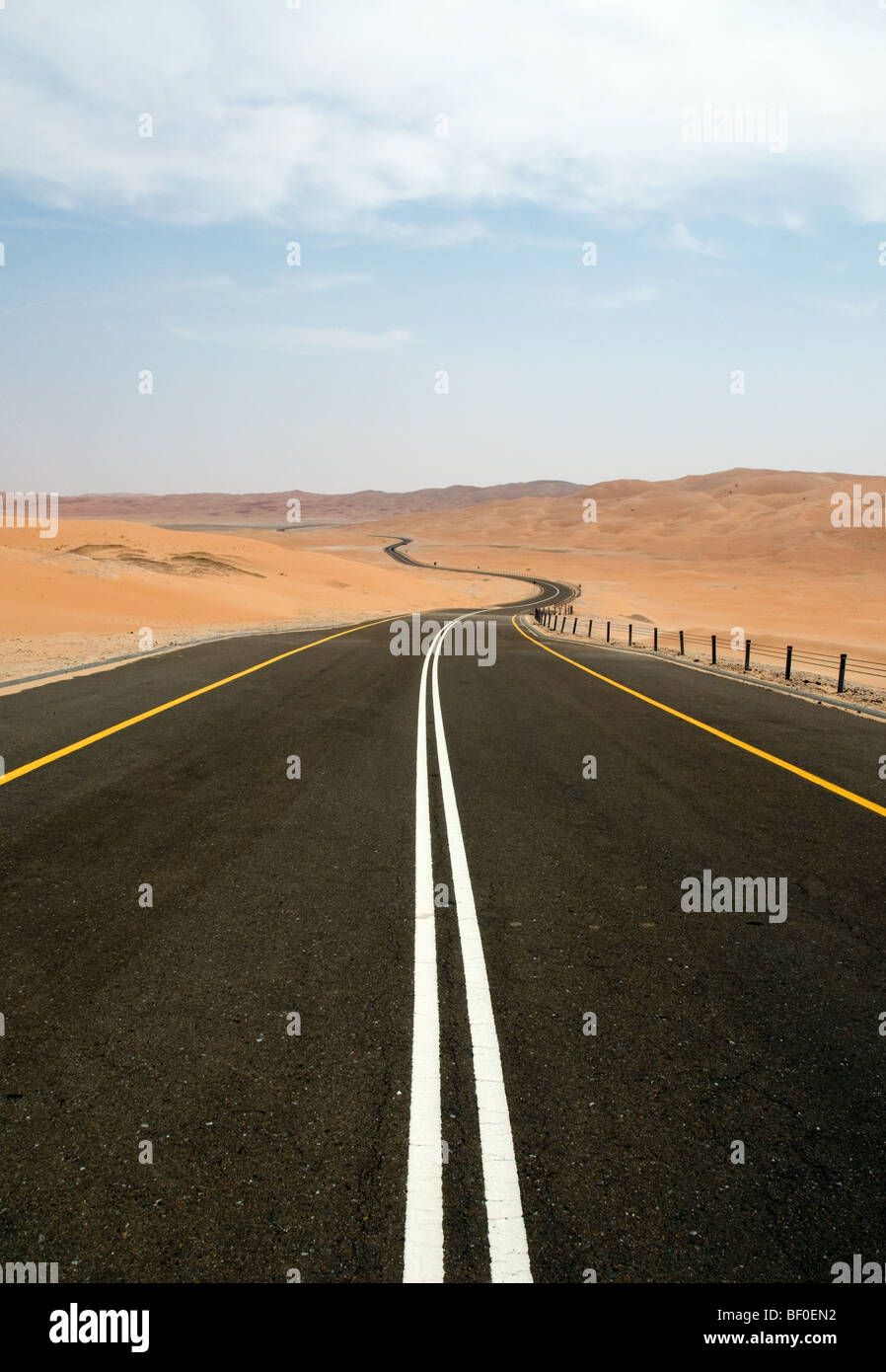 Desert road in Liwa, Abu Dhabi, UAE Stock Photo - Alamy