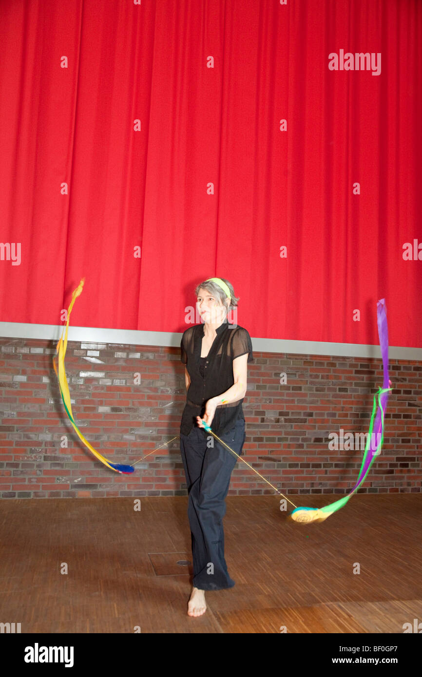 Circus Act - Mature Woman performing wih Ribbons Stock Photo - Alamy