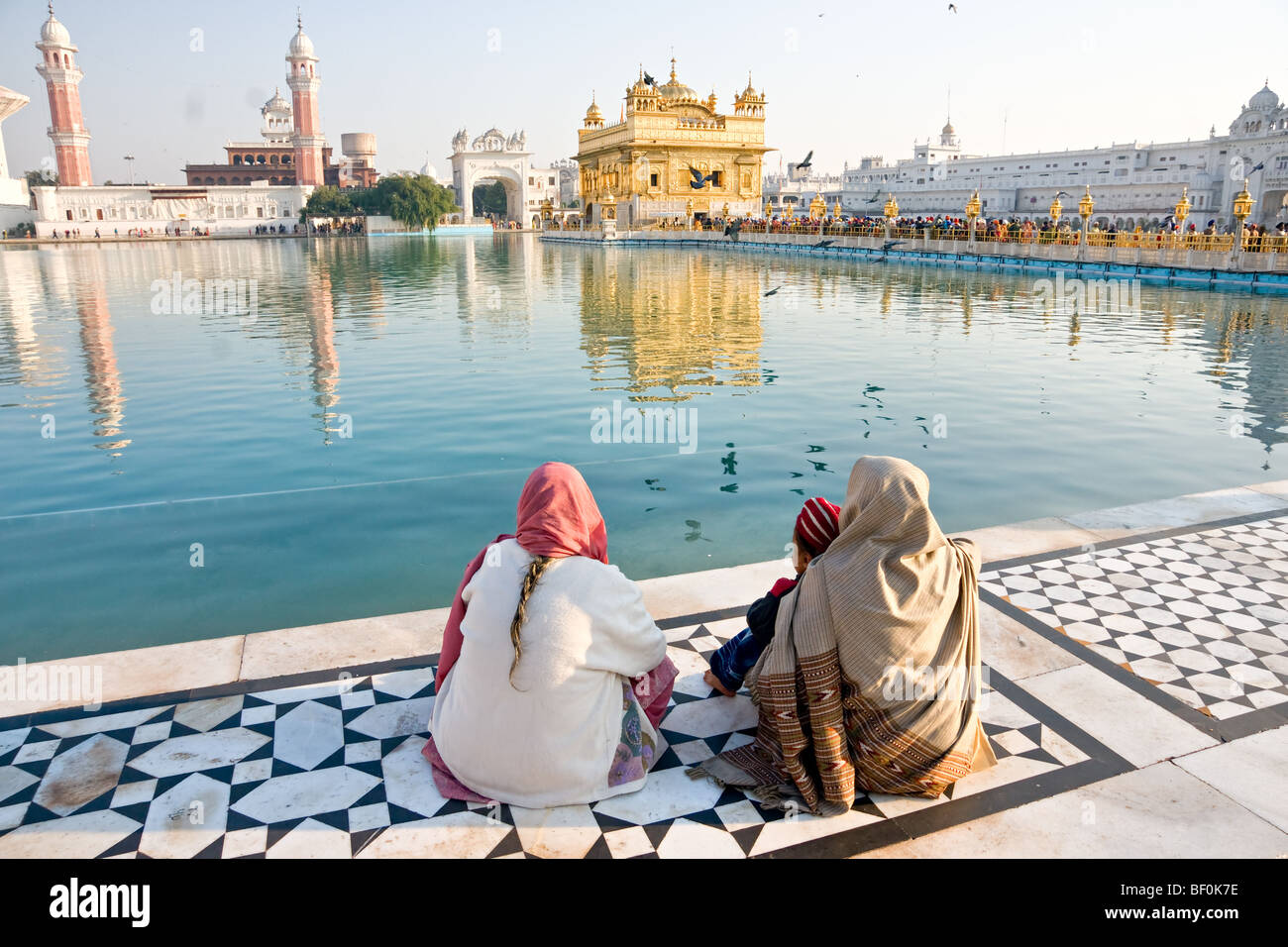 People visiting and praying at Golden Temple, Amritsar, Punjab Stock ...