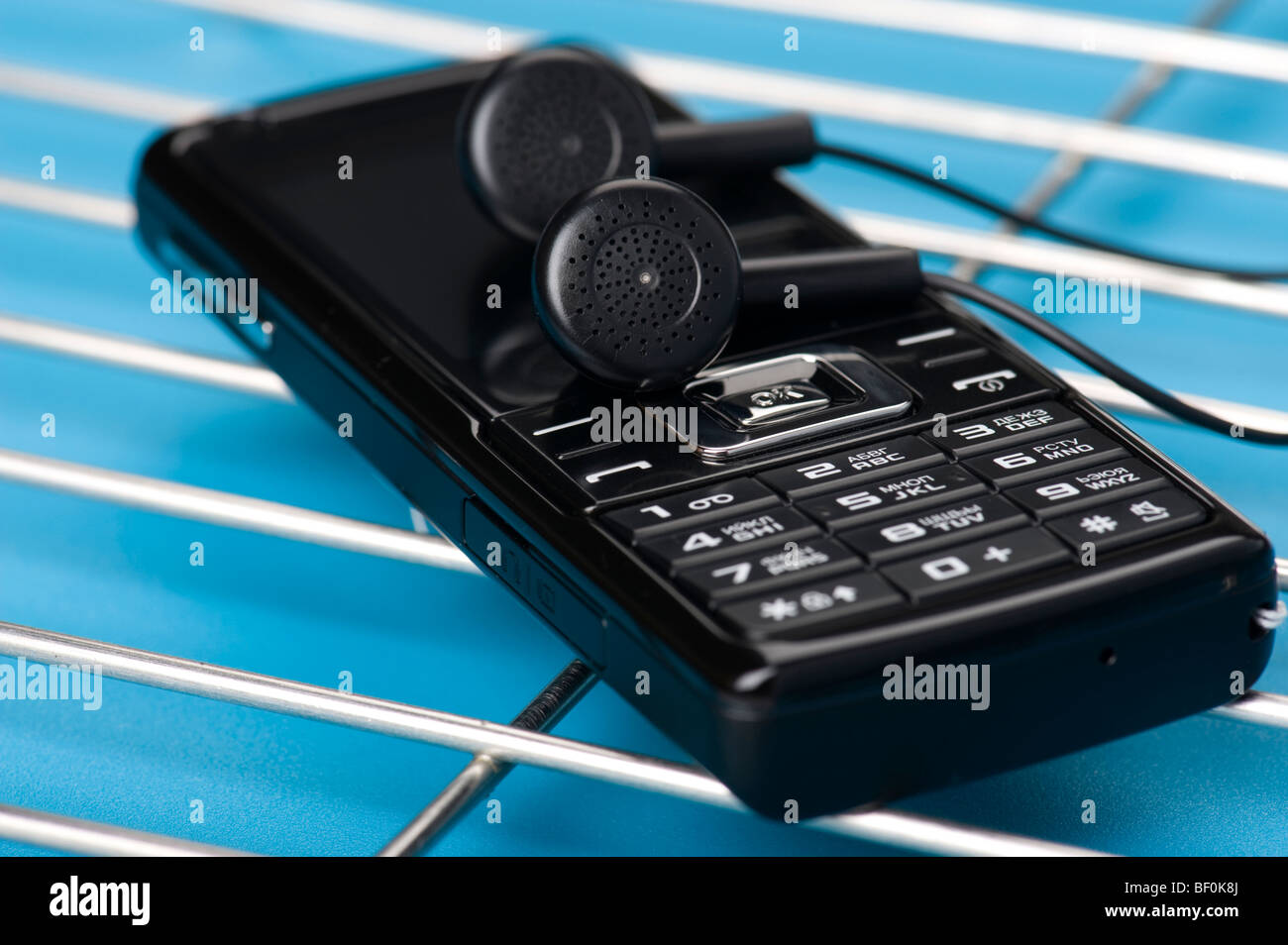 Object on blue mobile hi-res stock photography and images - Alamy