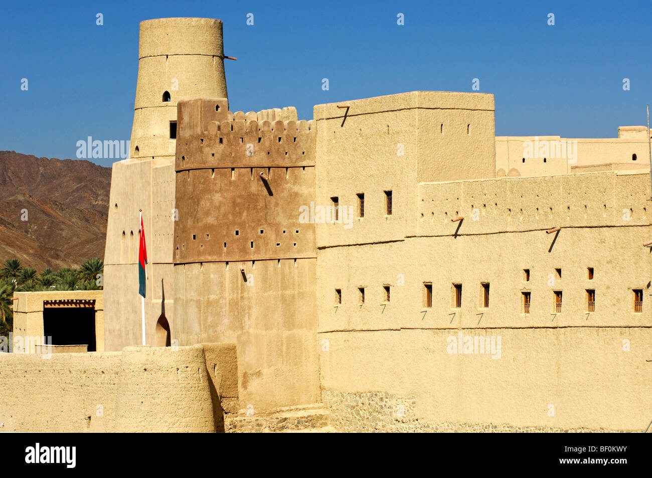 Thick external adobe walls of Bahla Fort, UNESCO World Heritage Site ...