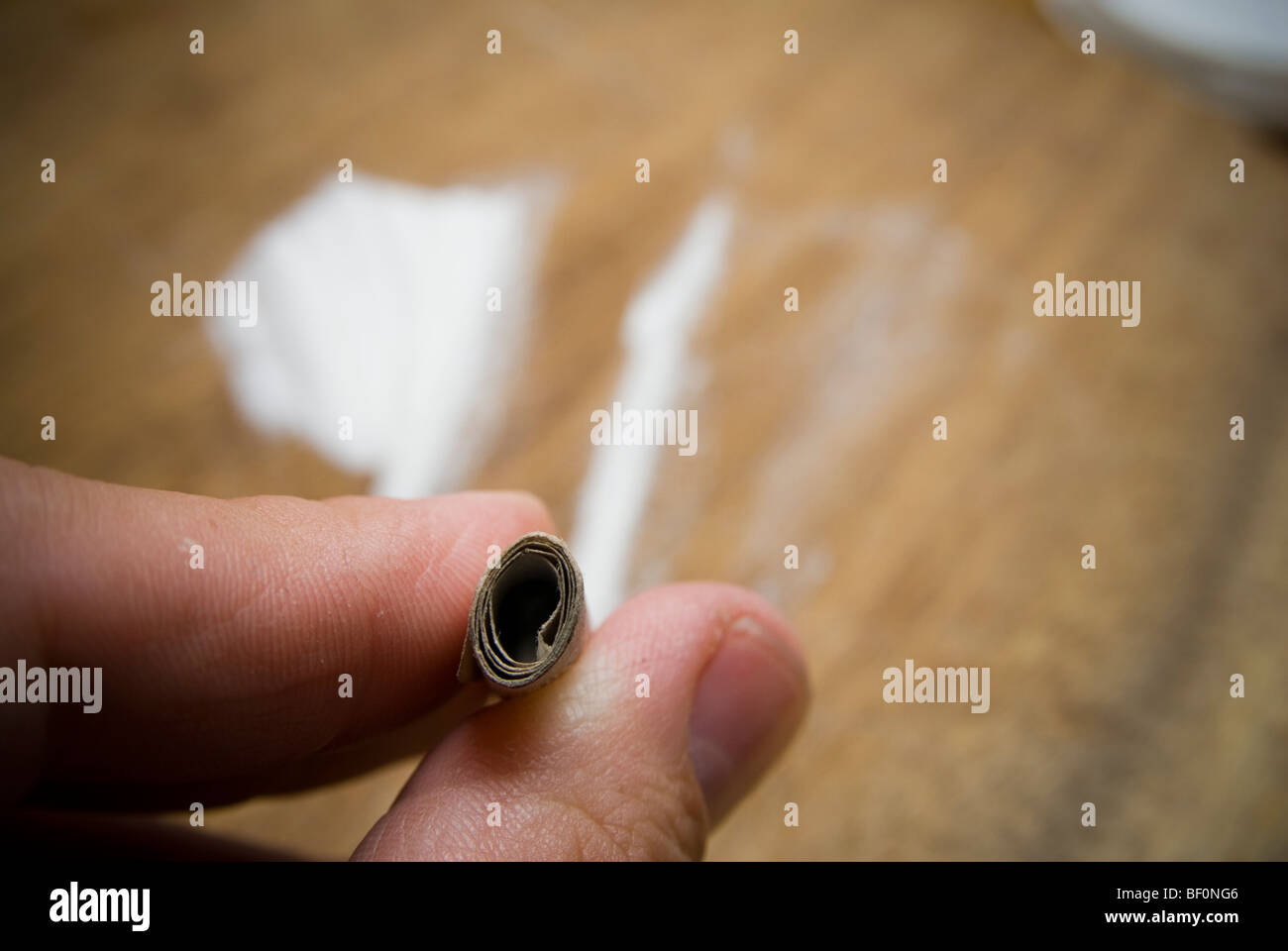 Drugs, a person handling class A drugs Stock Photo - Alamy