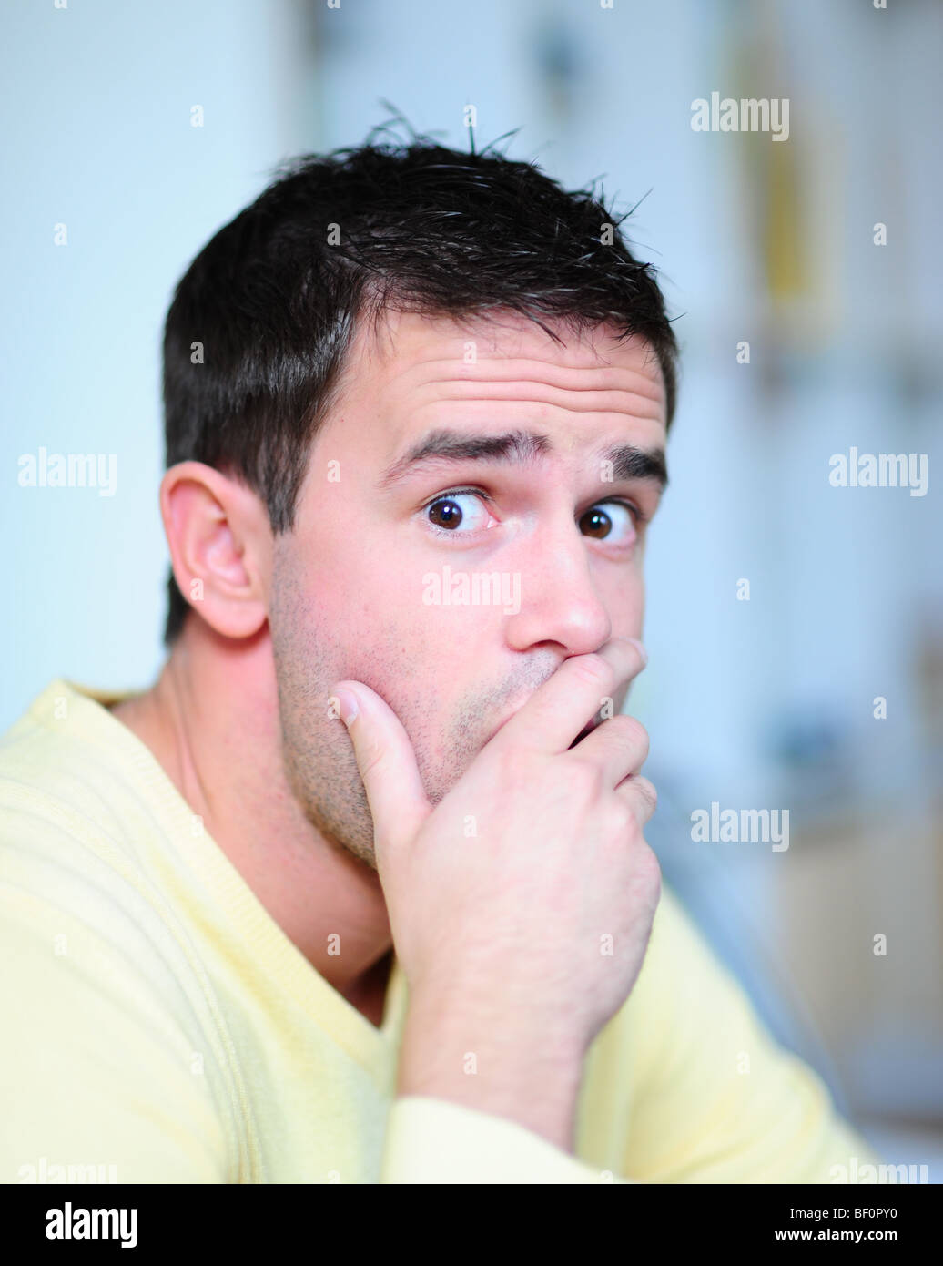 Terrified Young Man Stock Photo - Alamy