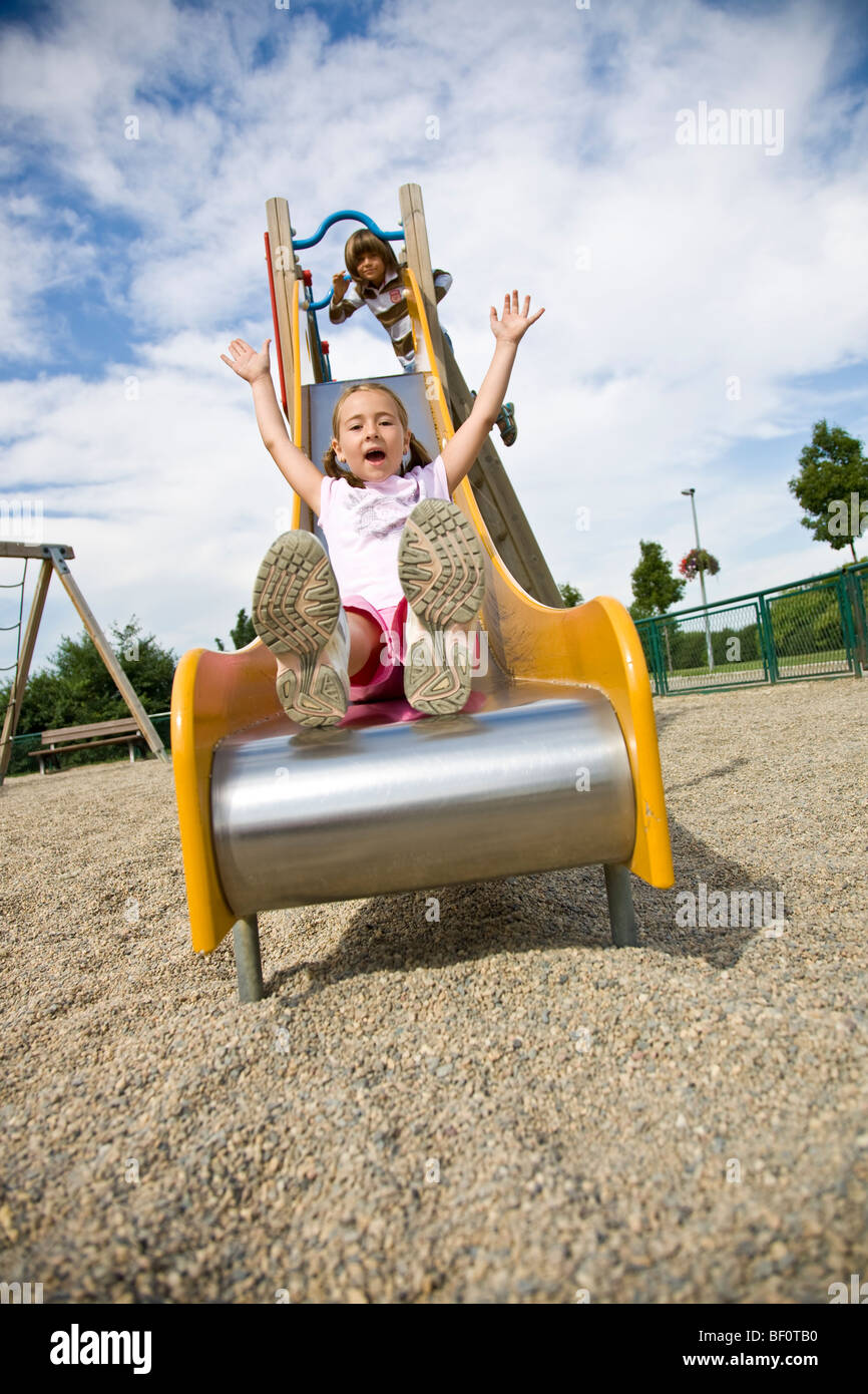 Girl on a slide hi-res stock photography and images - Alamy