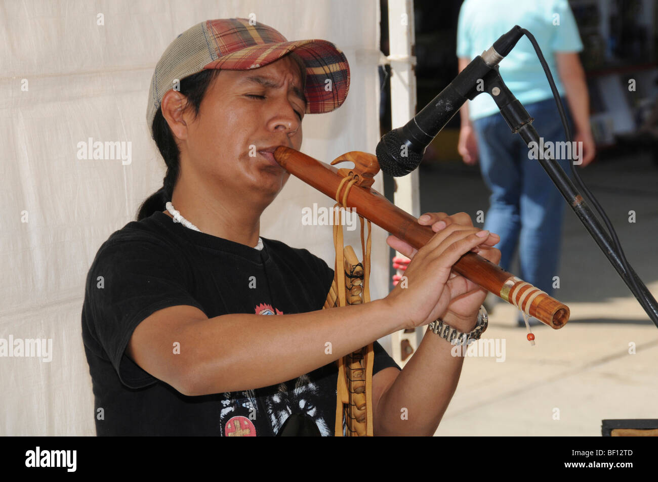 man playing a flute Stock Photo - Alamy