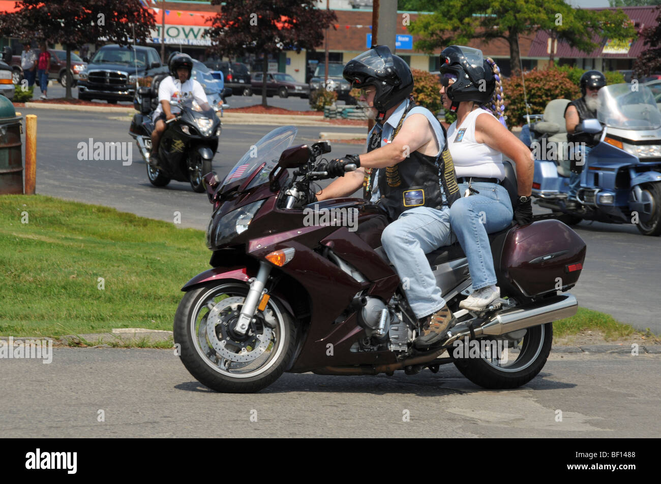 Couple riding harley davidson motorcycle hi-res stock photography and ...