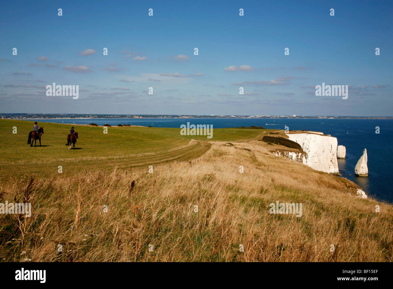 Horse-riding on the cliff tops above Old Harry Rocks on Dorset's ...