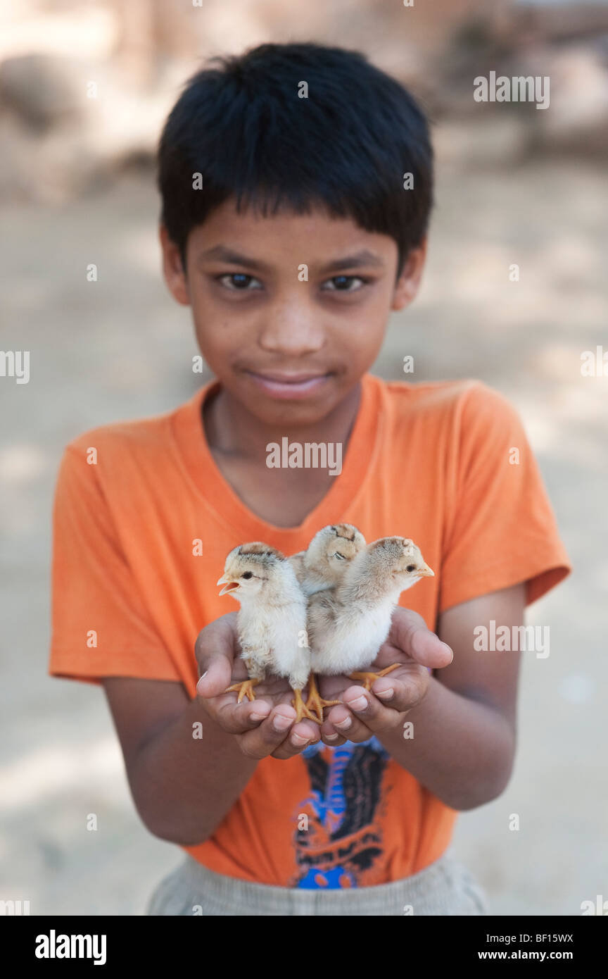 Children with chicks in hi-res stock photography and images - Alamy