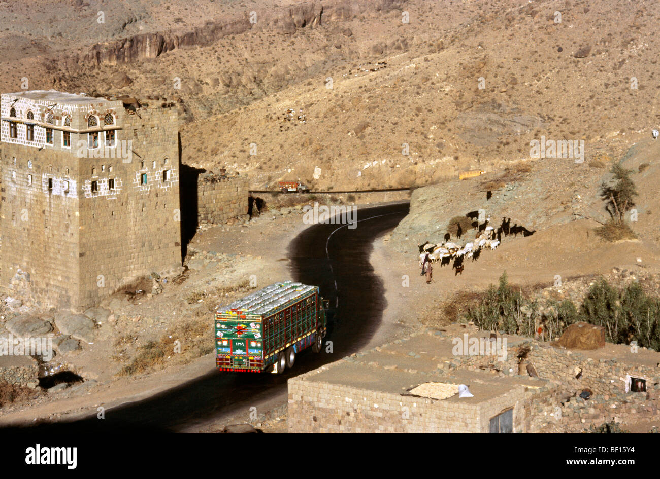 North Yemen Lorry On The Road By Shepherd And His Herd Of Goats Stock ...