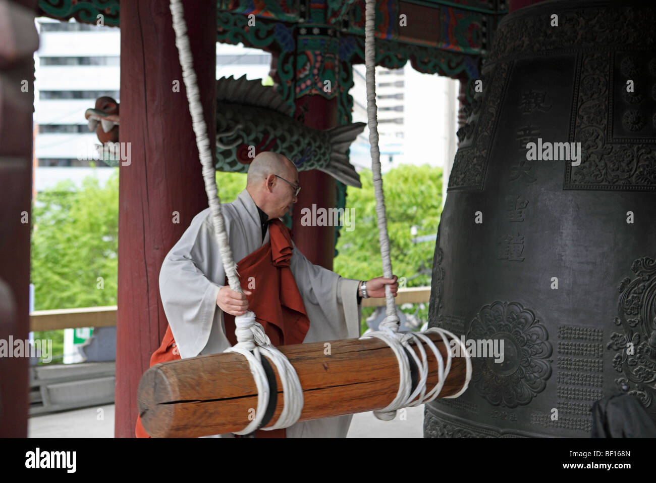Buddhist Monk Striking Temple Bell Seoul South Korea Stock Photo - Alamy
