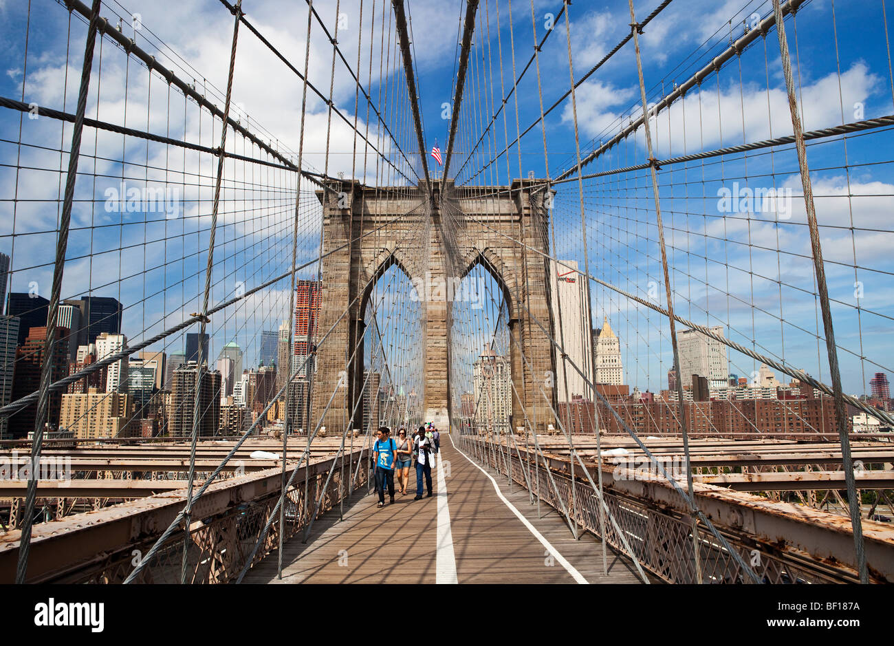 People walking across bridge hi-res stock photography and images - Alamy