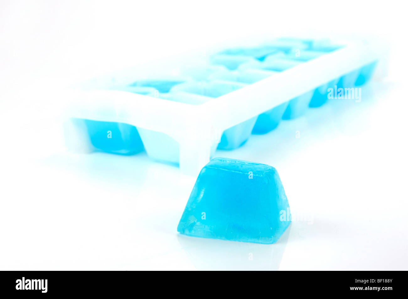 Blue ice blocks isolated against a white background Stock Photo - Alamy