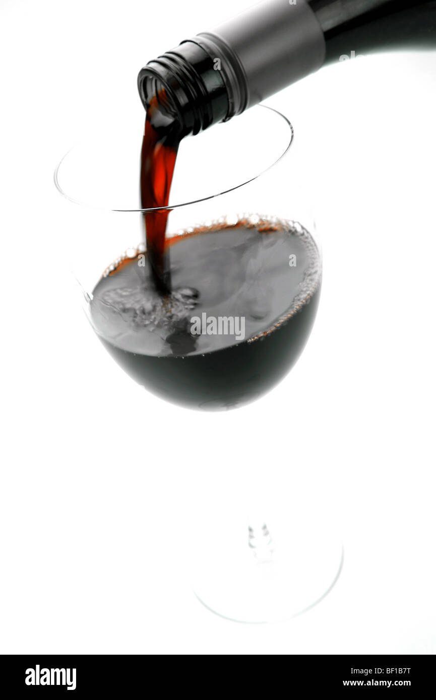 Glasses of red wine isolated against a white background Stock Photo - Alamy