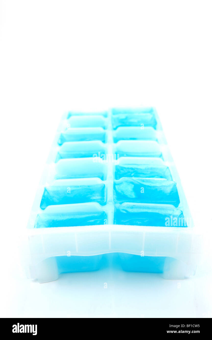 Blue ice blocks isolated against a white background Stock Photo - Alamy