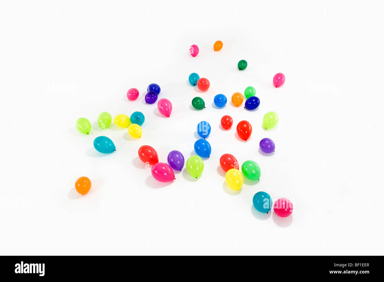 Colored balloons on the ground Stock Photo - Alamy