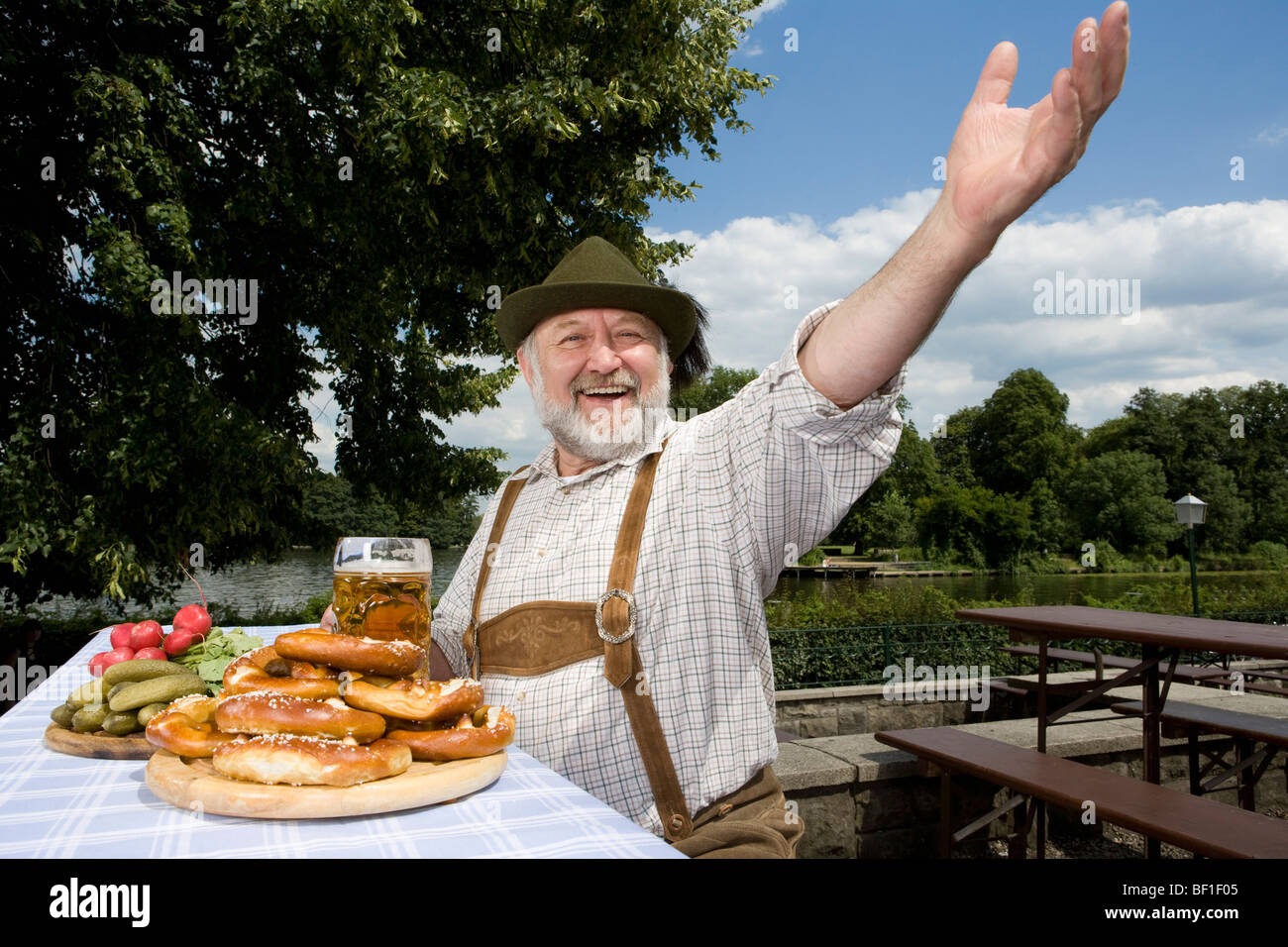 A traditionally clothed German man in a beer garden Stock Photo - Alamy