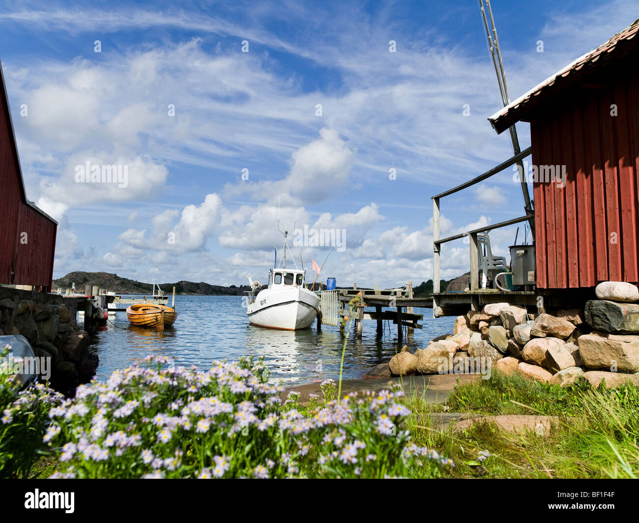 Boats moored to a jetty, Bohuslan, Sweden Stock Photo - Alamy