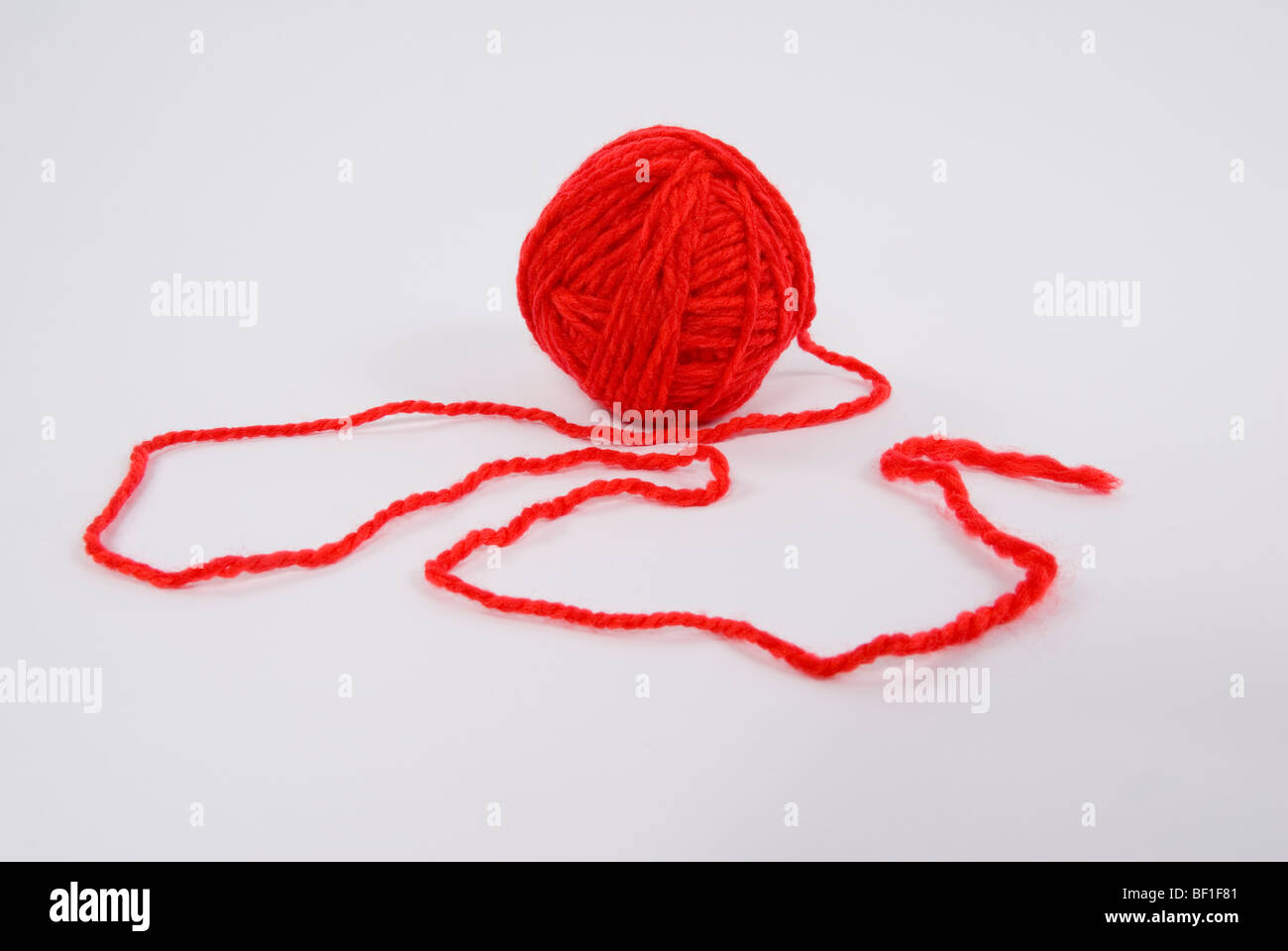 Red ball yarn hi-res stock photography and images - Alamy