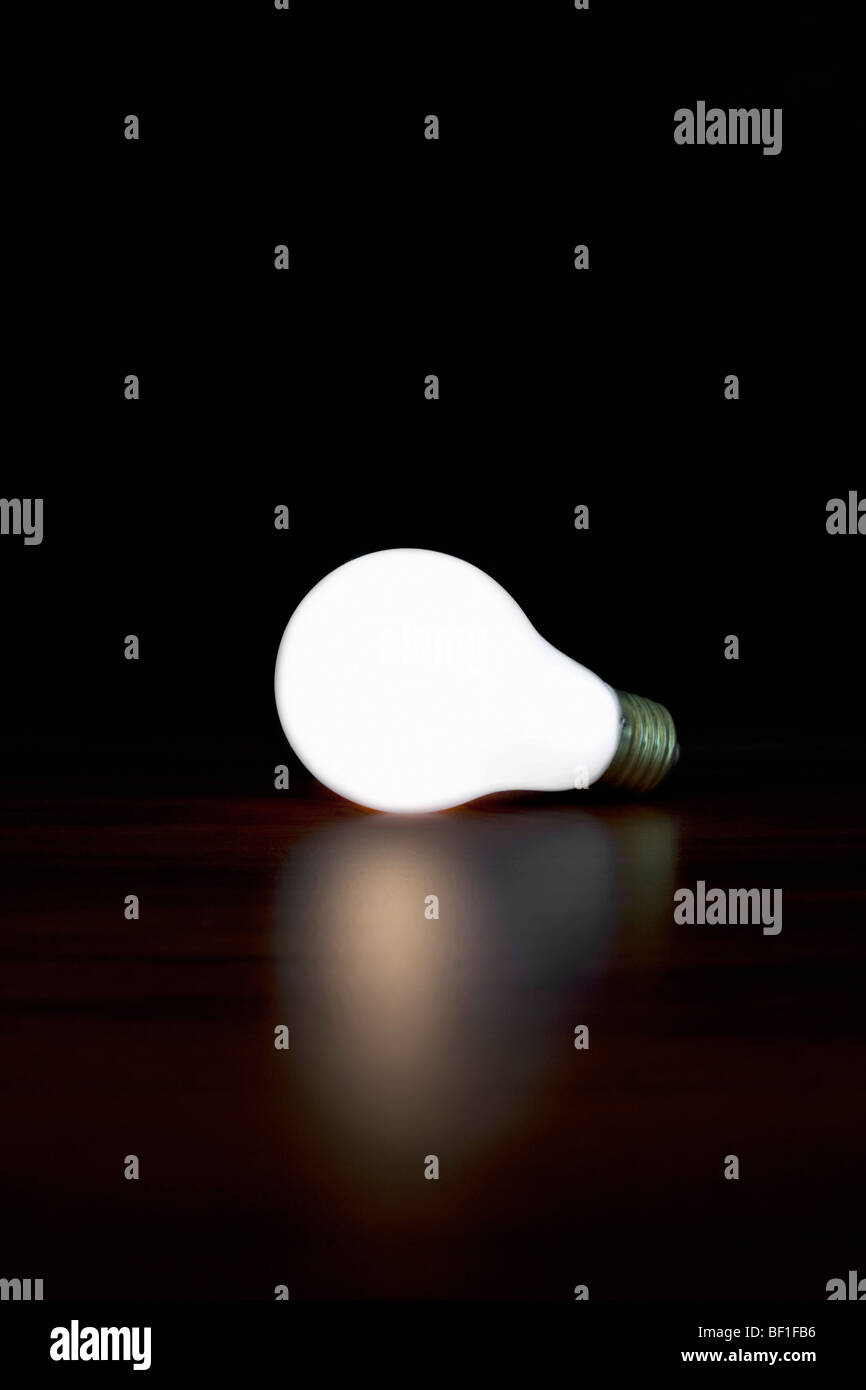 An illuminated light bulb Stock Photo - Alamy