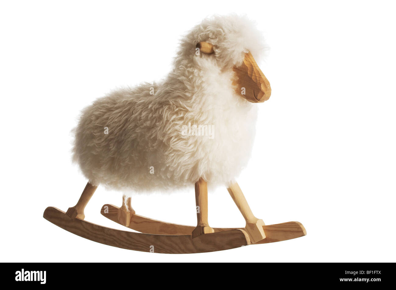 A rocking-sheep against white background Stock Photo - Alamy