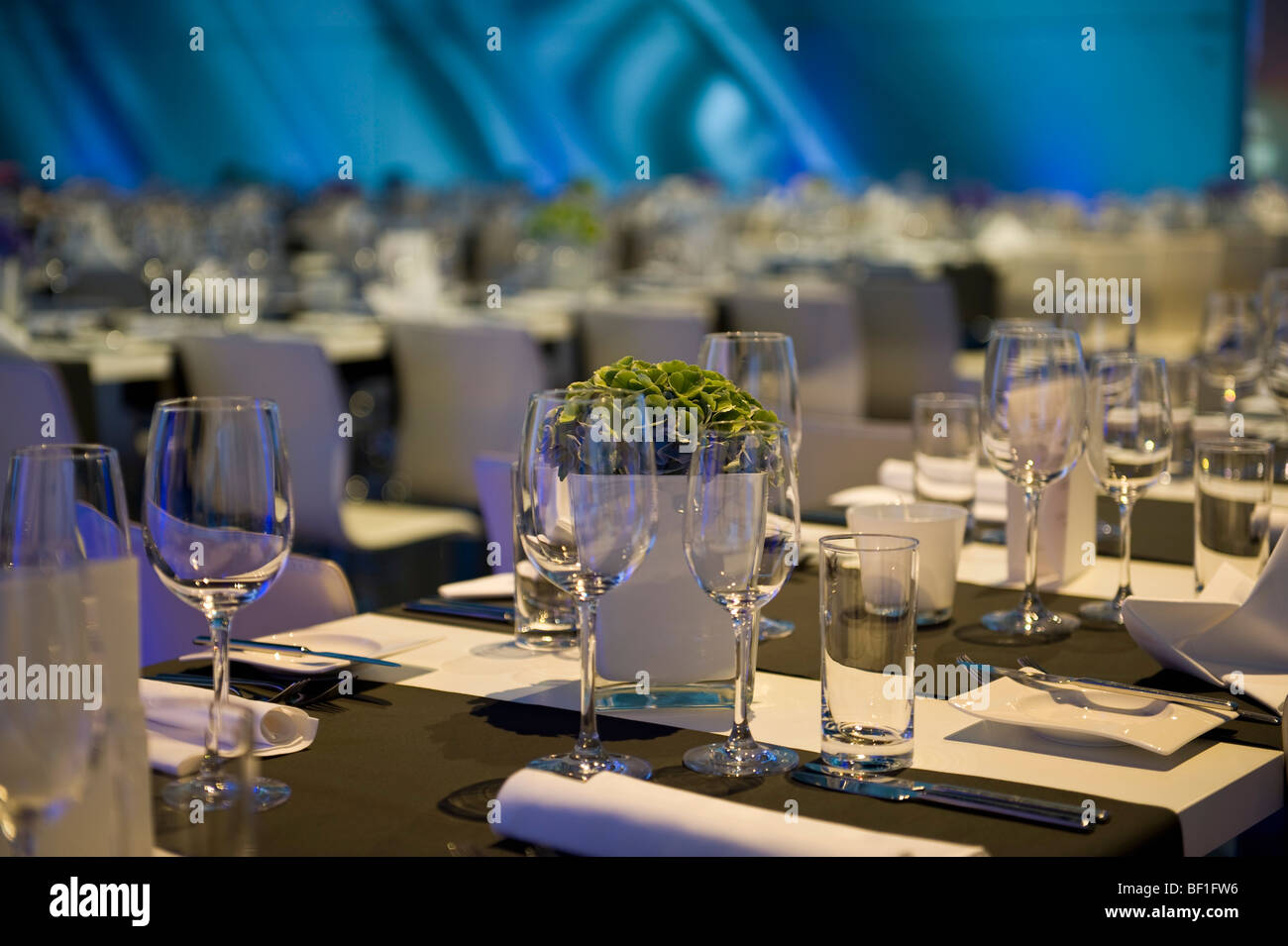 A set dining table in a restaurant Stock Photo - Alamy